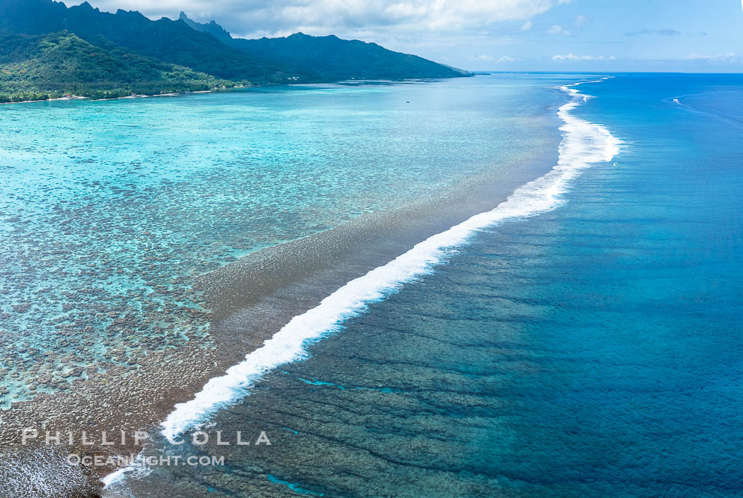 Waves break on Moorea's Barrier Reef, French Polynesia, France